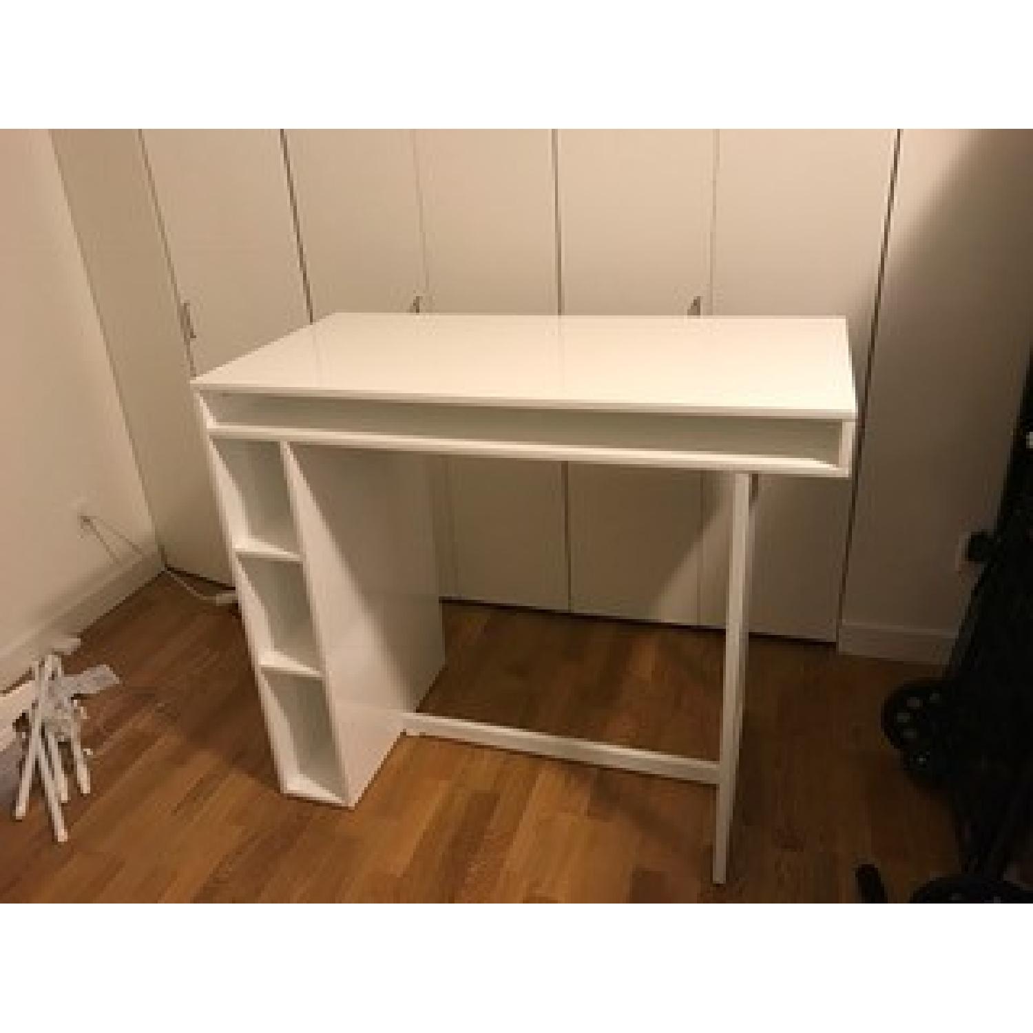 CB2 White High Top Table - AptDeco