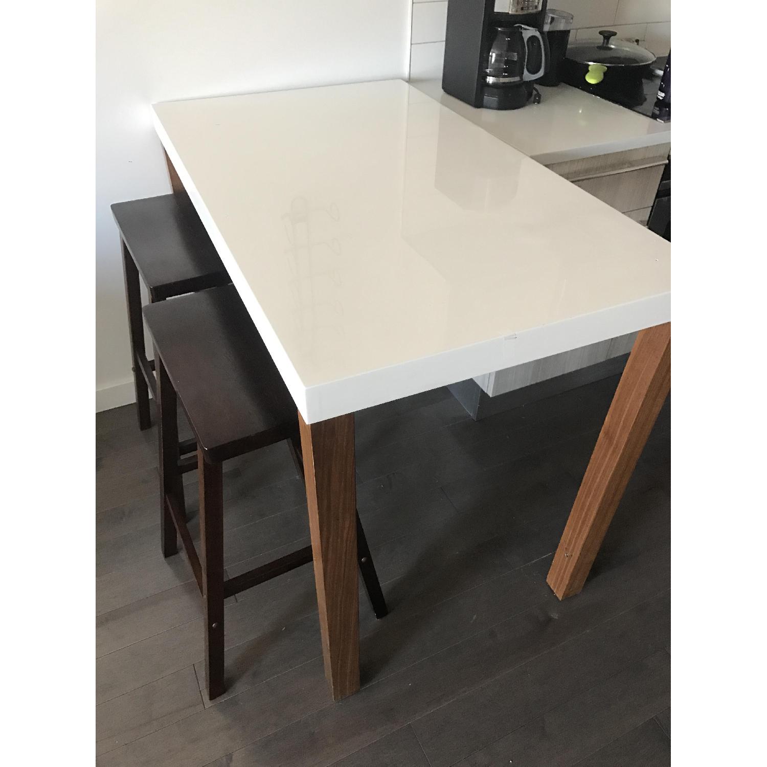 Crate & Barrel High Top Table w/ 2 Stools - AptDeco