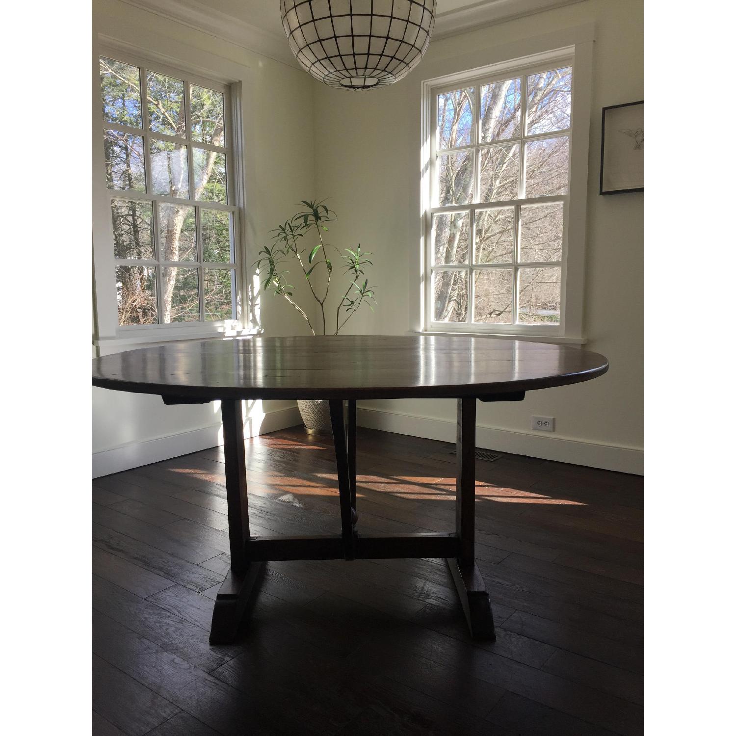 Antique Round Dining Table - AptDeco