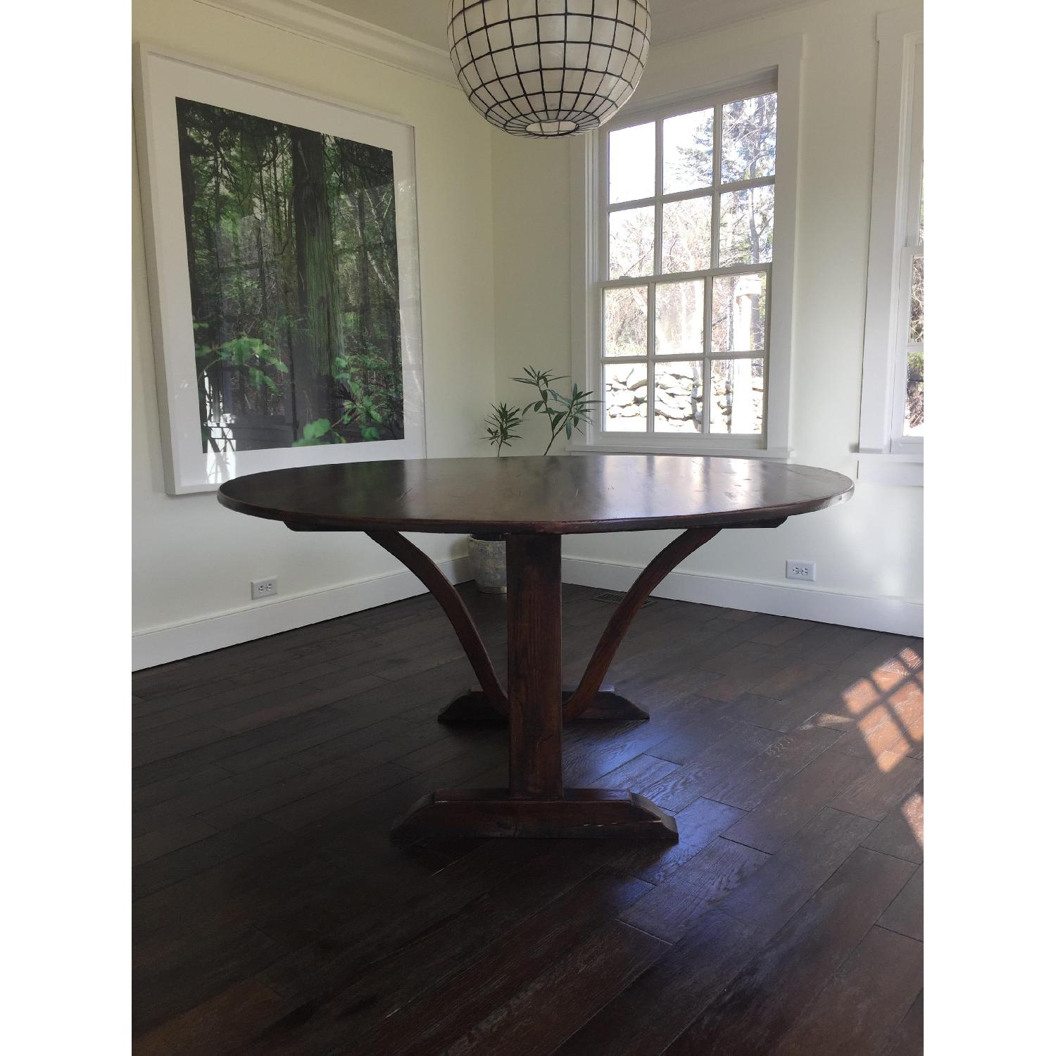 Antique Round Dining Table - AptDeco