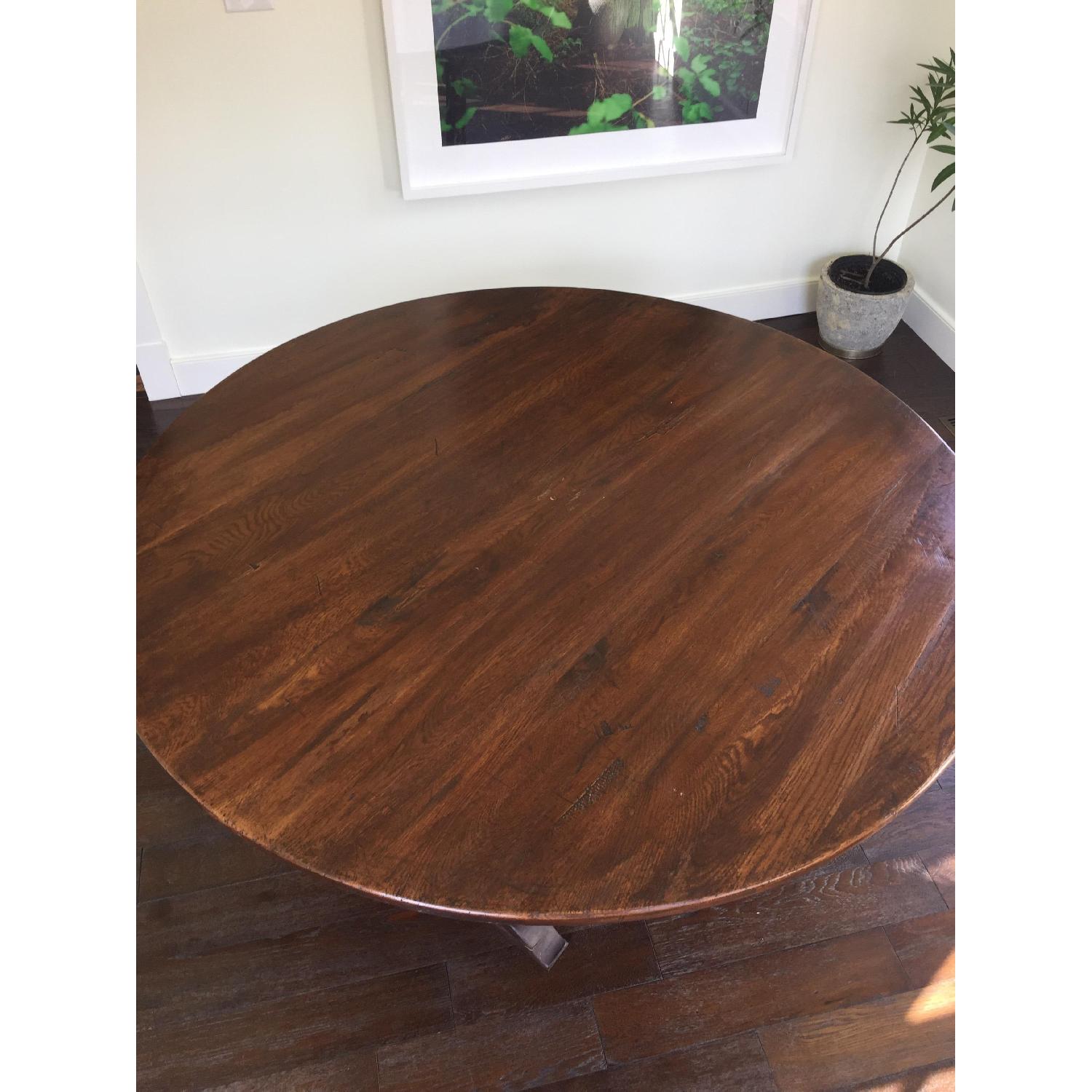 Antique Round Dining Table - AptDeco
