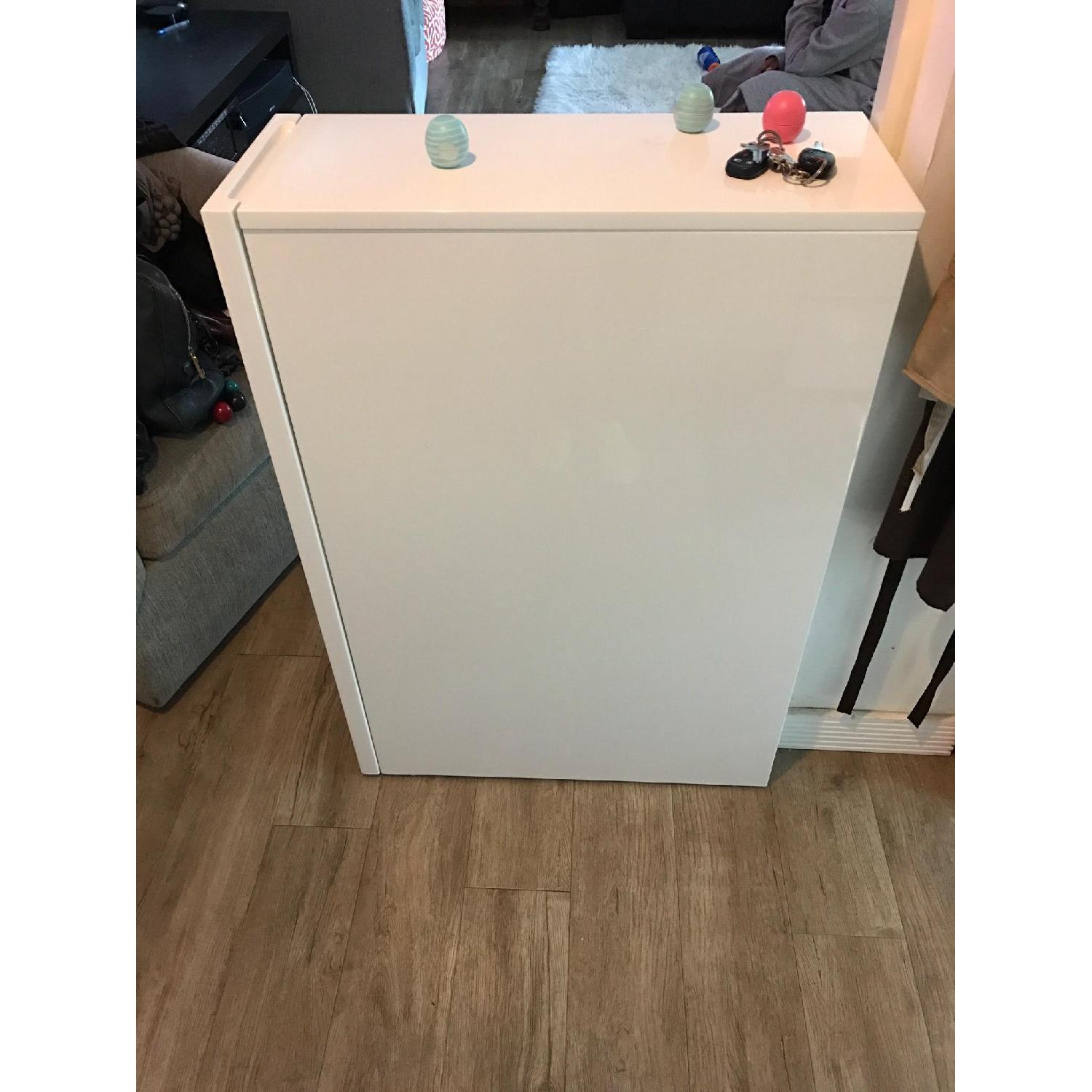 CB2 White Storage Cabinet/Bar. - AptDeco