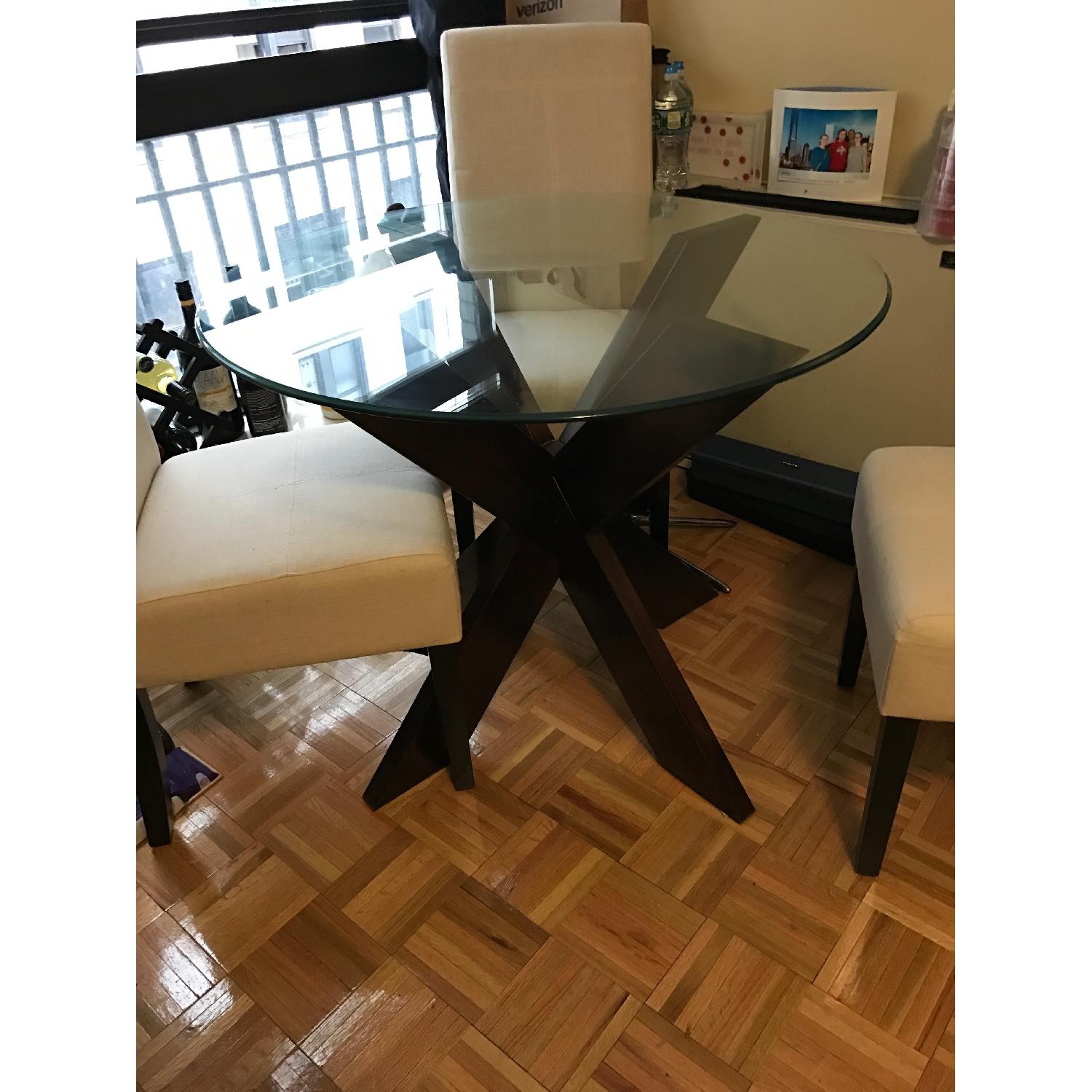 Pier 1 Simon Round Glass Top/X Base Dining Table w/ 4 Chairs - AptDeco