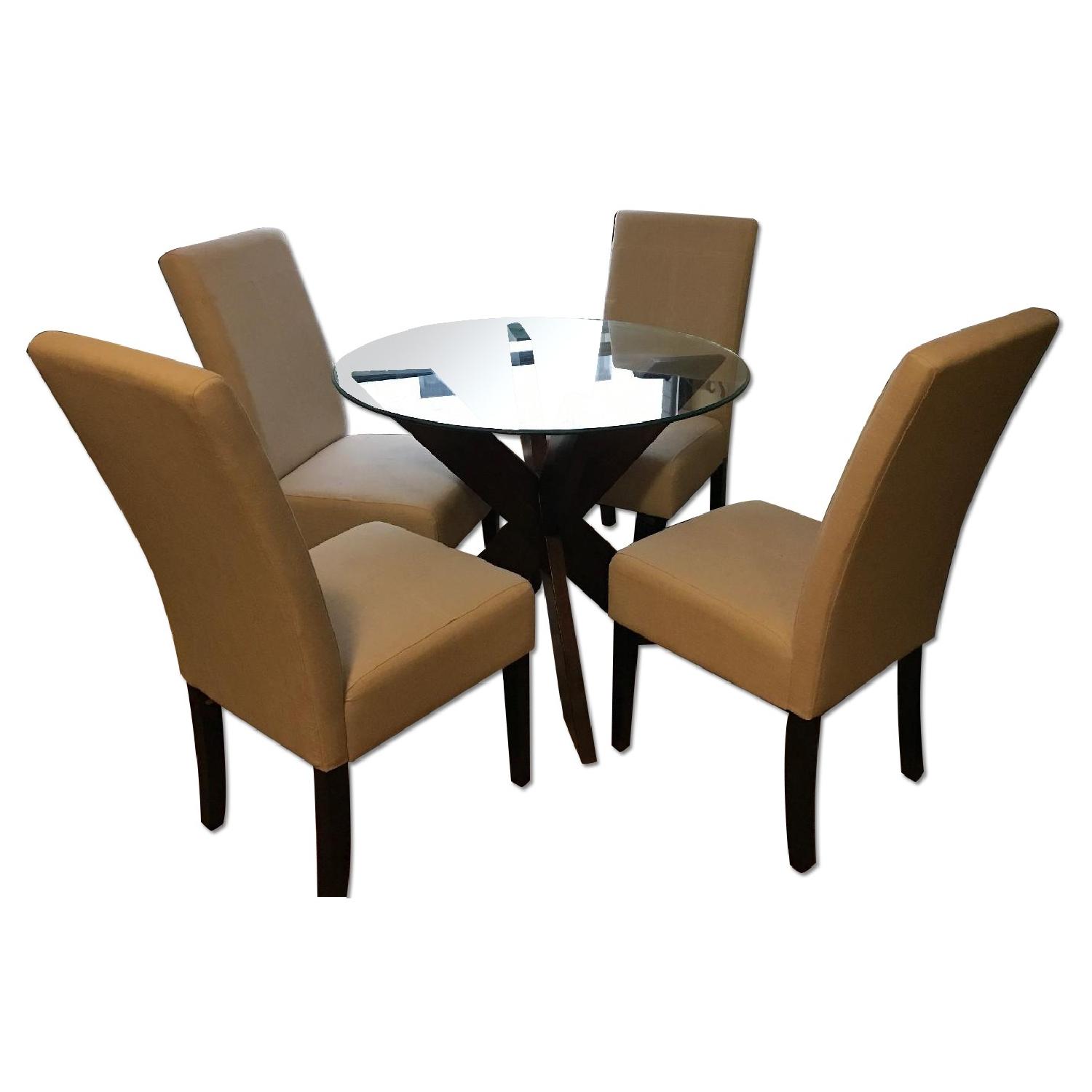 Pier 1 Simon Round Glass Top/X Base Dining Table w/ 4 Chairs - AptDeco