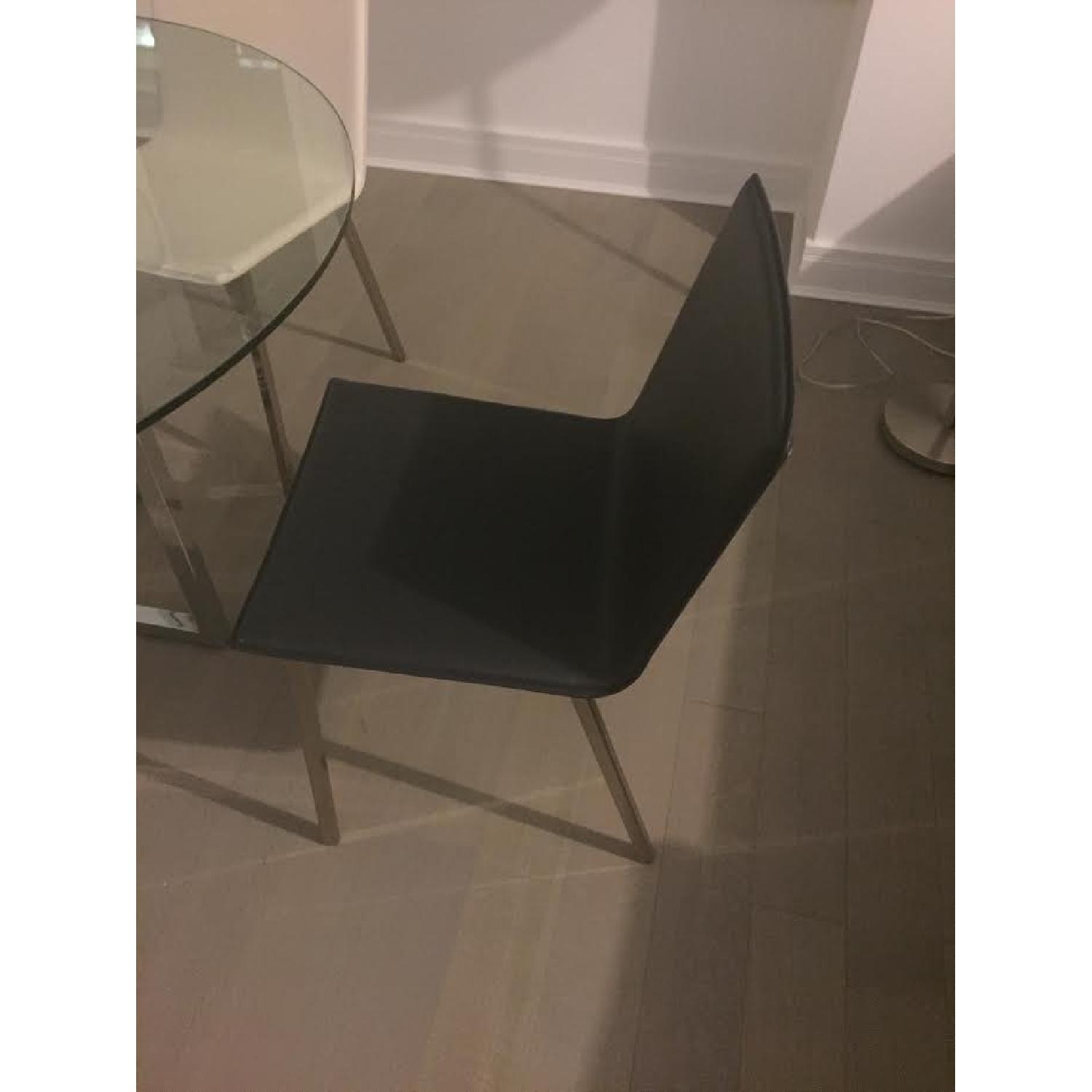 CB2 Silverado Round Dining Table w/ 4 Phoenix Chairs - AptDeco