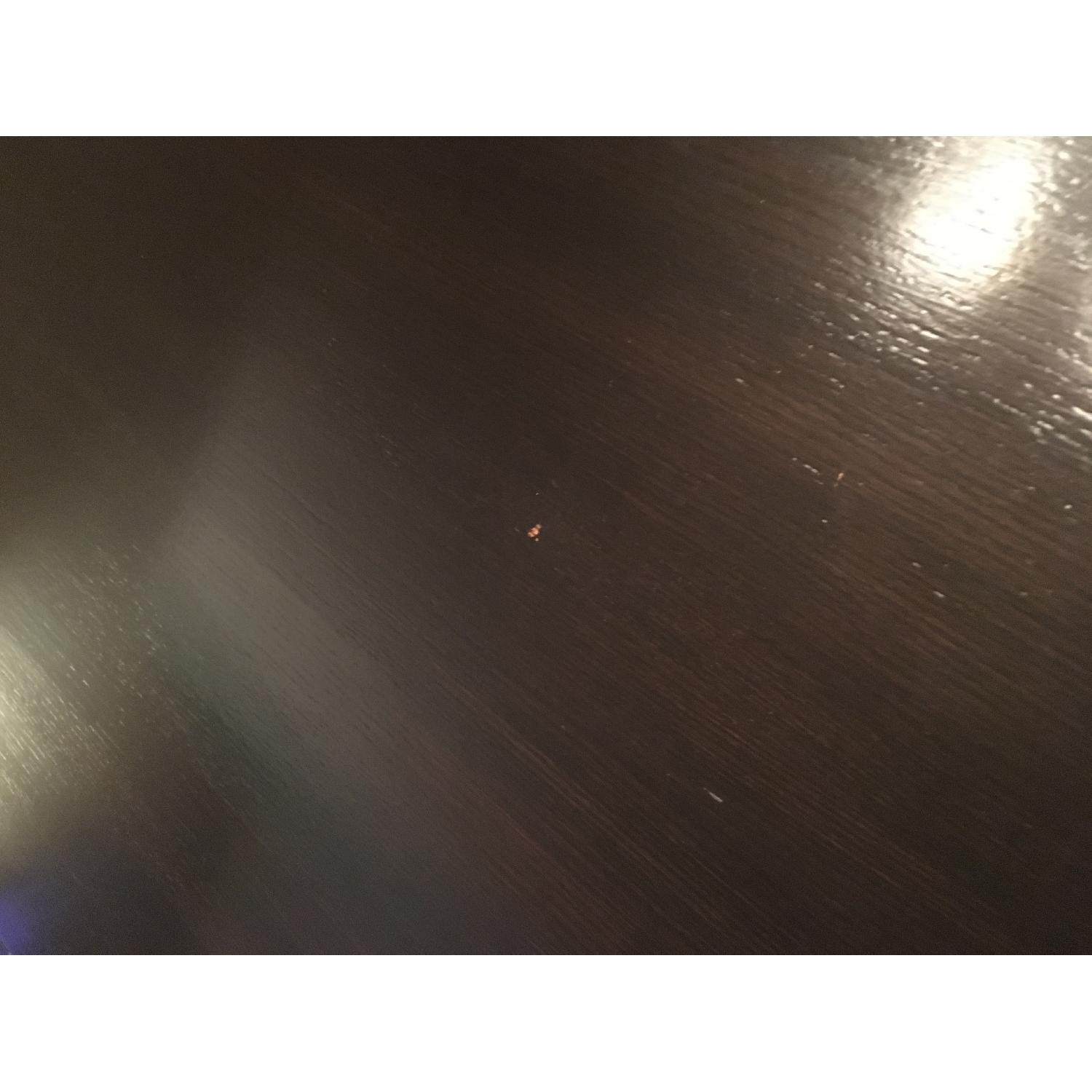 Crate & Barrel Asher Benjamin Solid Oak Round Dining Table - AptDeco