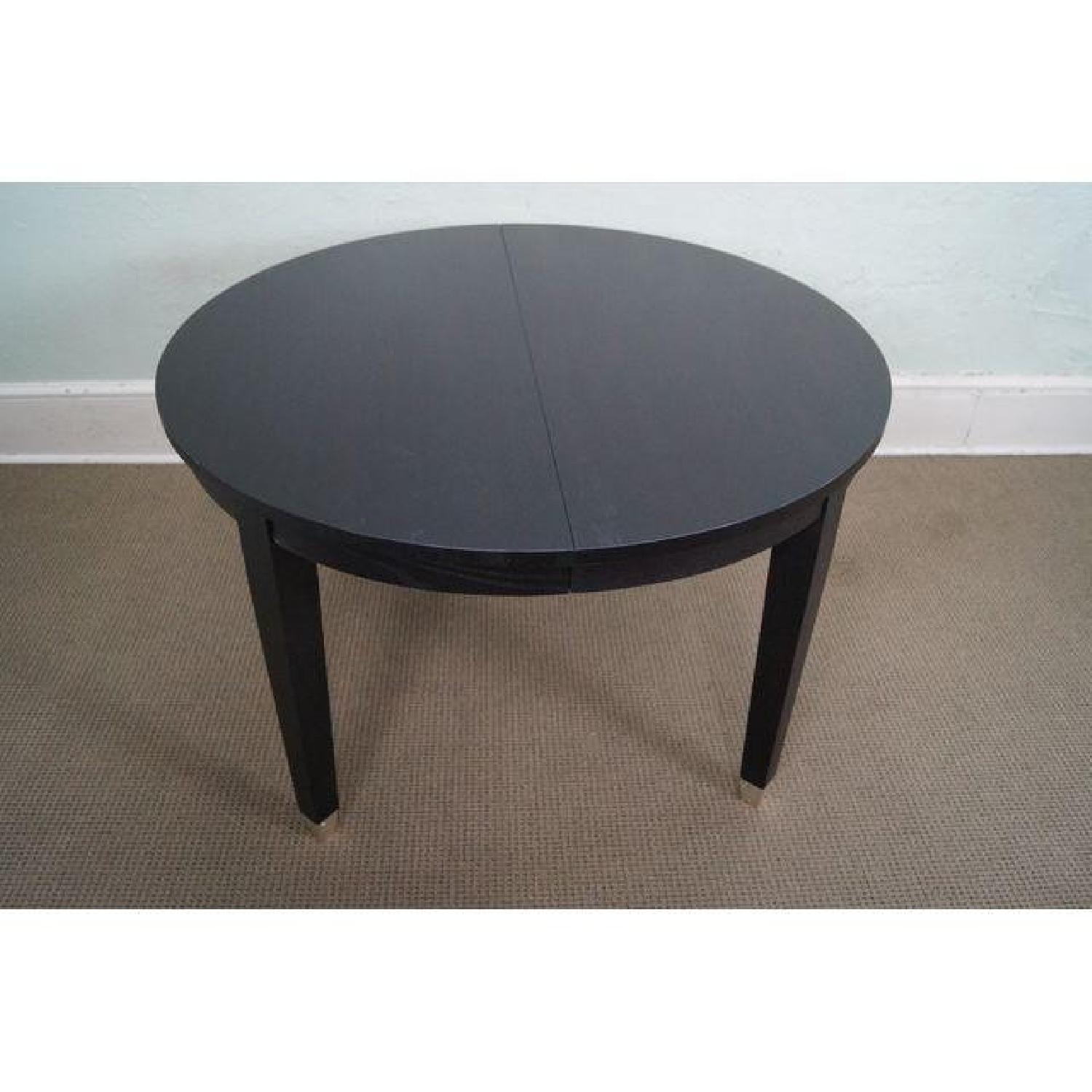 Crate & Barrel Asher Benjamin Solid Oak Round Dining Table - AptDeco