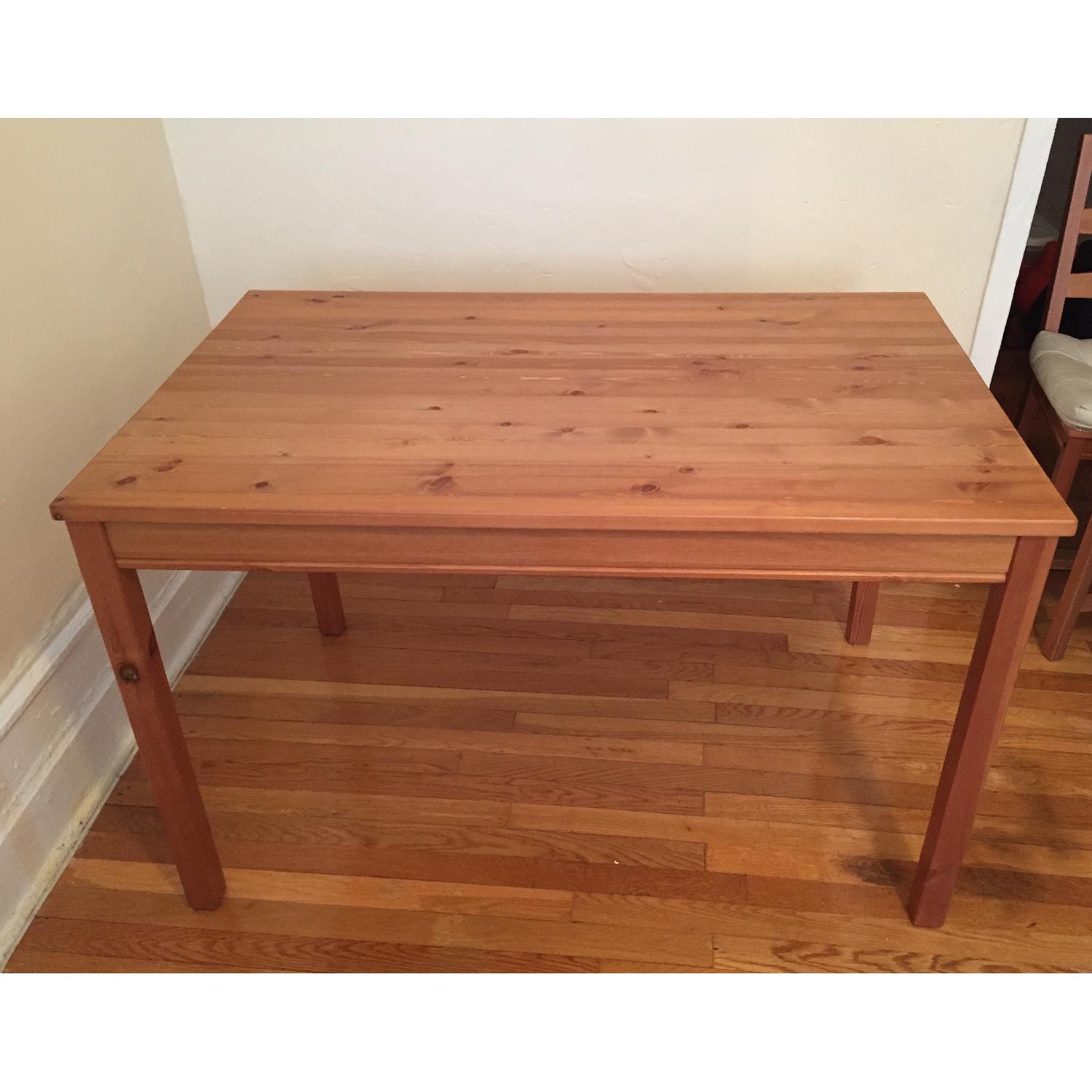 Ikea Solid Pine Wood Table w/ 4 Chairs - AptDeco