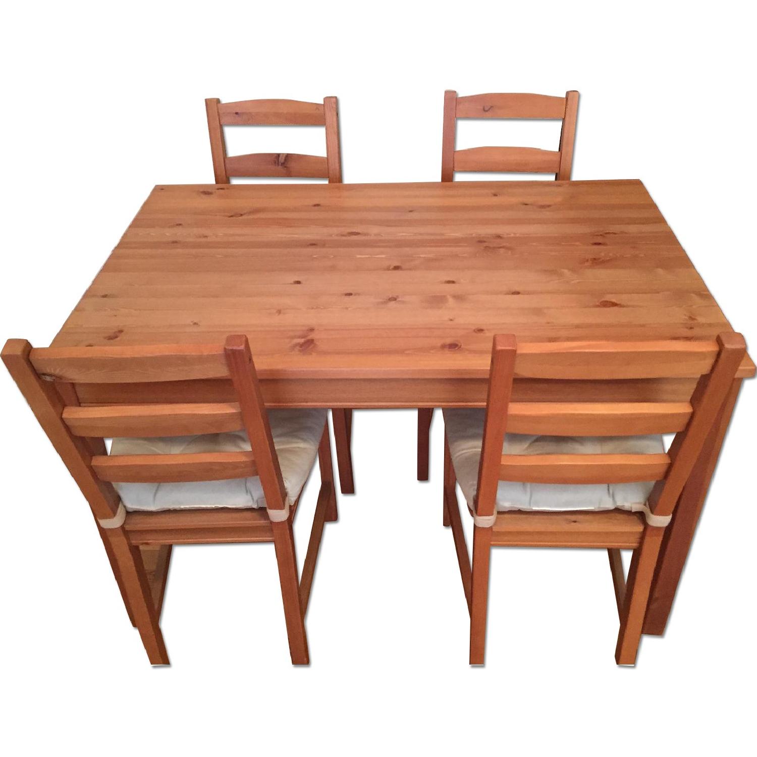 Ikea Solid Pine Wood Table w/ 4 Chairs - AptDeco