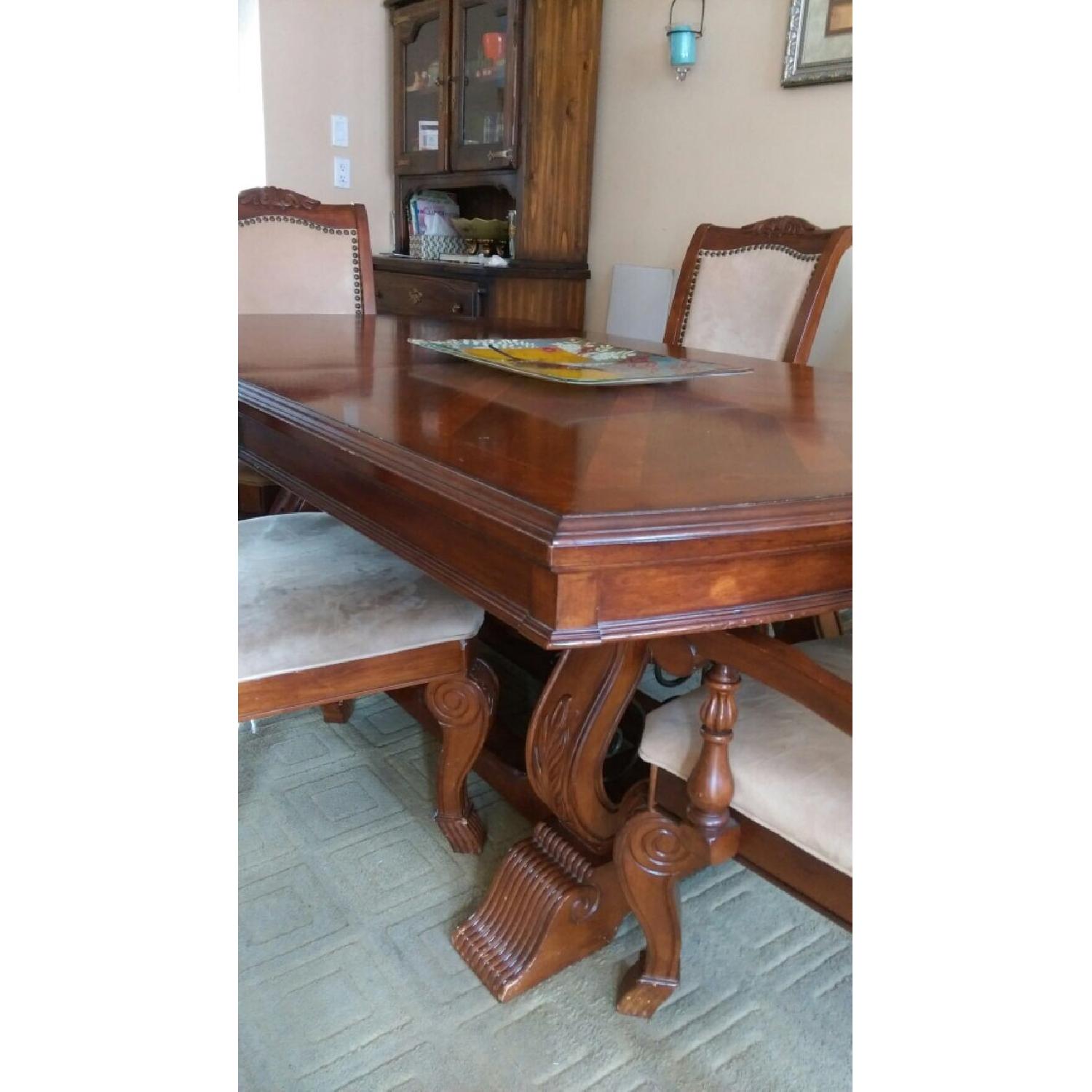 Levitz Furniture Oak Wood Dining Table w/ 6 Chairs - AptDeco