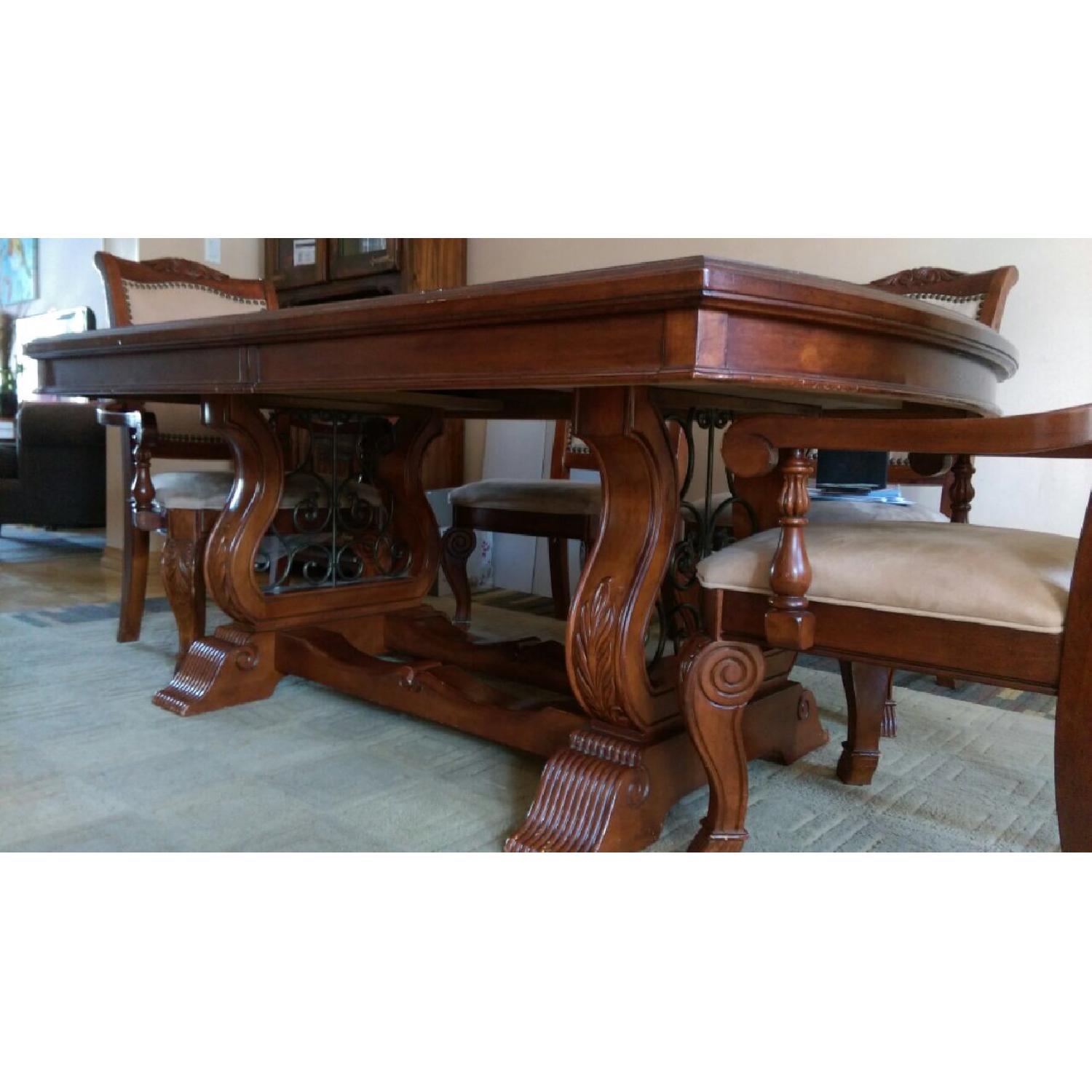 Levitz Furniture Oak Wood Dining Table w/ 6 Chairs - AptDeco