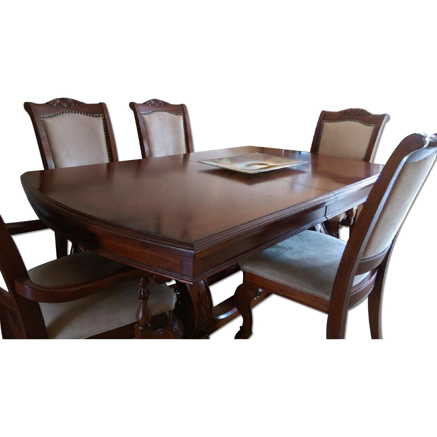 Levitz Furniture Oak Wood Dining Table w/ 6 Chairs - AptDeco