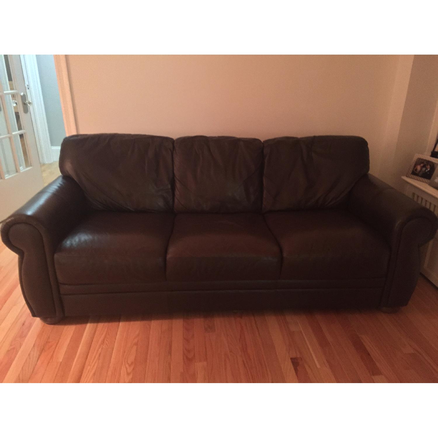 Raymour & Flanigan Leather Couch - AptDeco