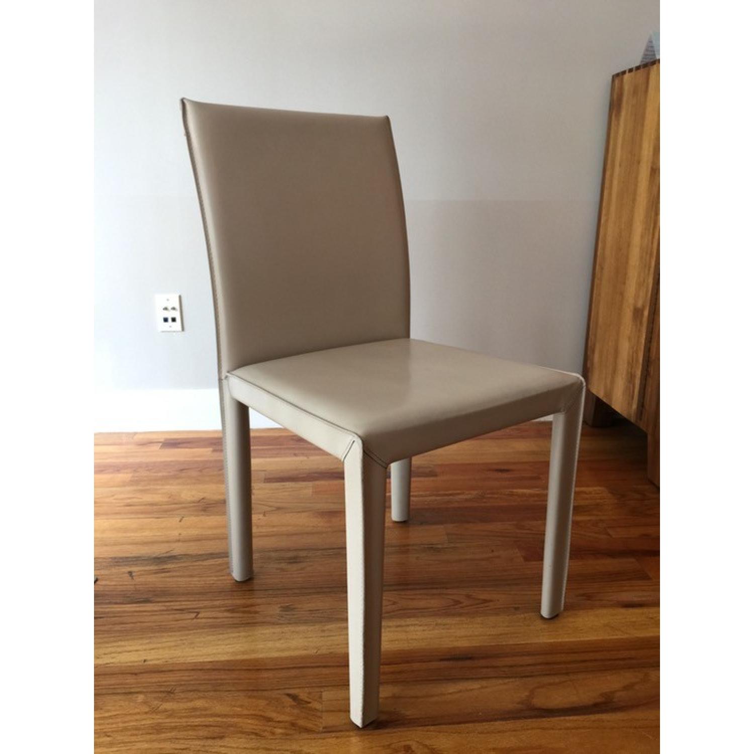 Crate & Barrel Folio Leather Dining Chairs - AptDeco