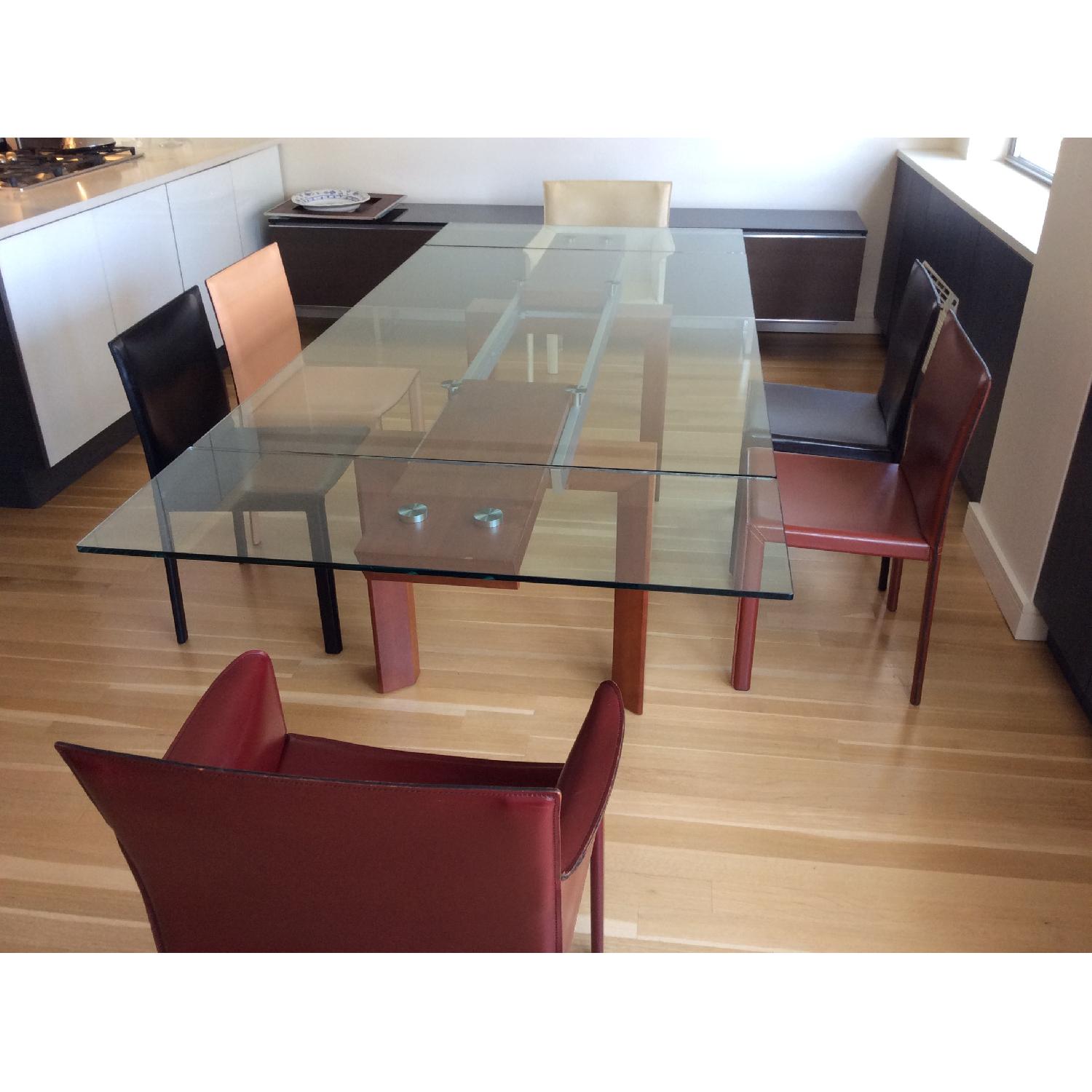 Italian Glass Table w/ 6 Leathers Chairs - AptDeco
